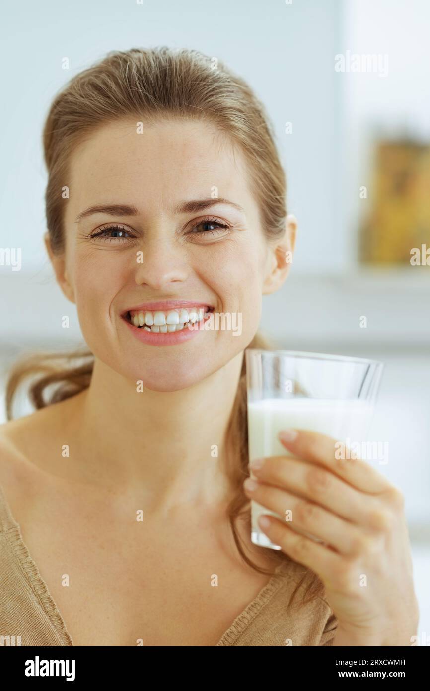 Woman eating milky almond hi-res stock photography and images - Alamy