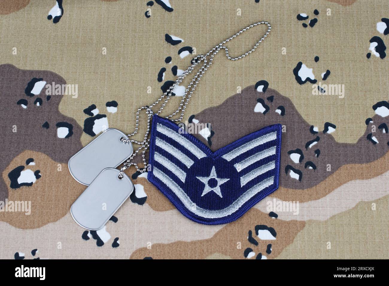US AIR FORCE Staff Sergeant rank patch and dog tags on desert ...