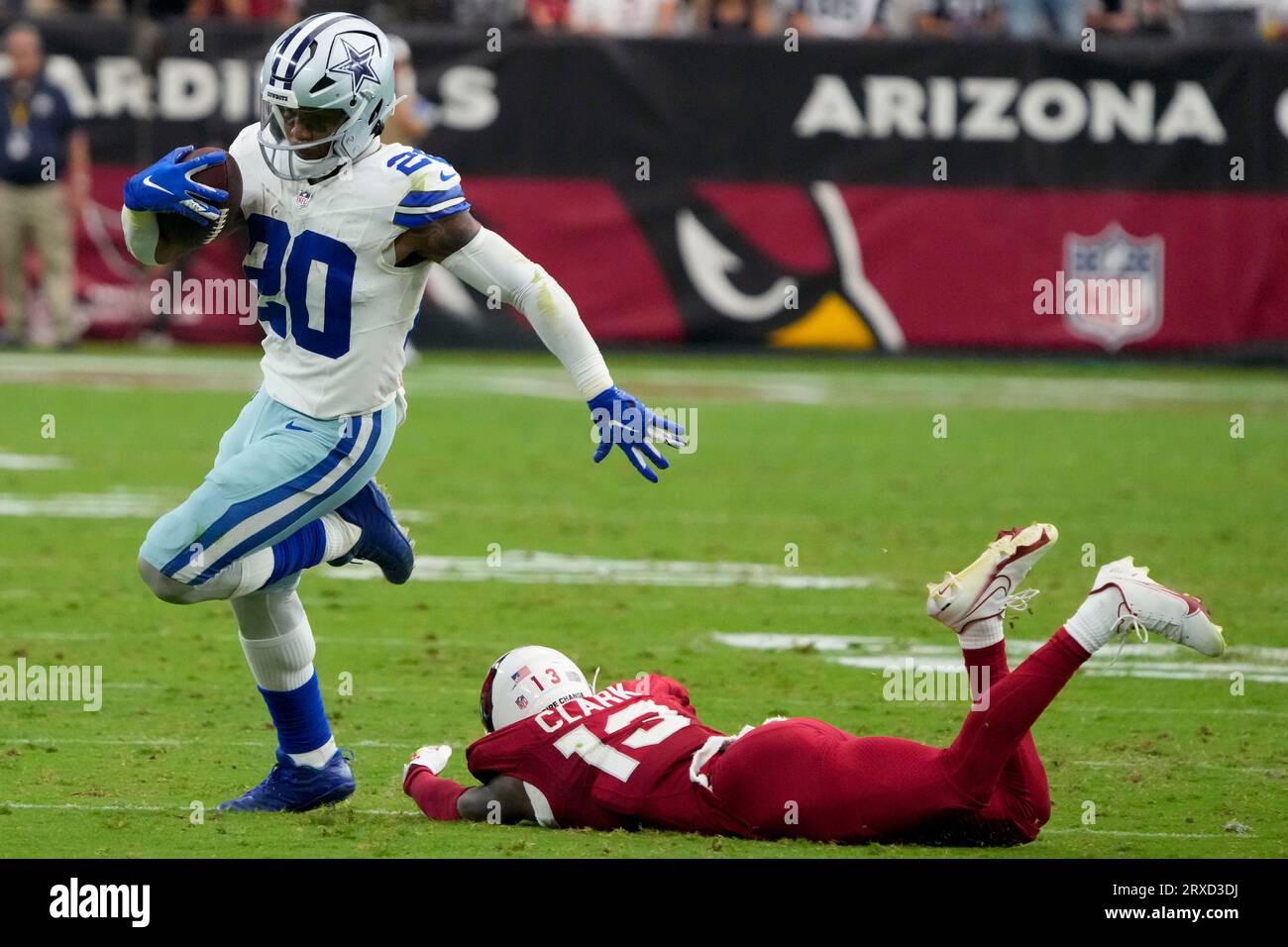Dallas Cowboys running back Tony Pollard (20) runs past Arizona ...