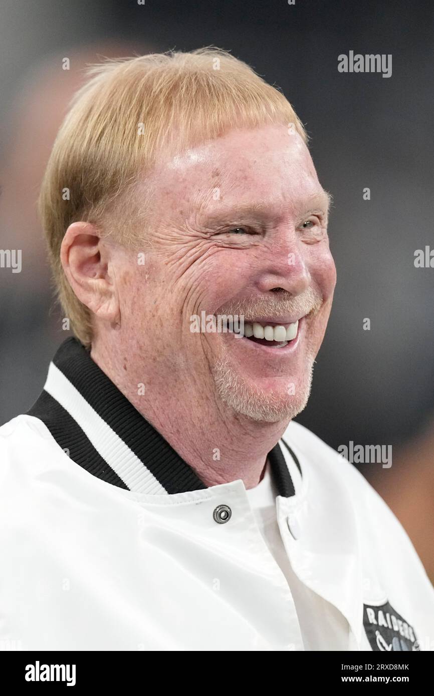 Las Vegas Raiders owner Mark Davis smiles on the field before an NFL ...