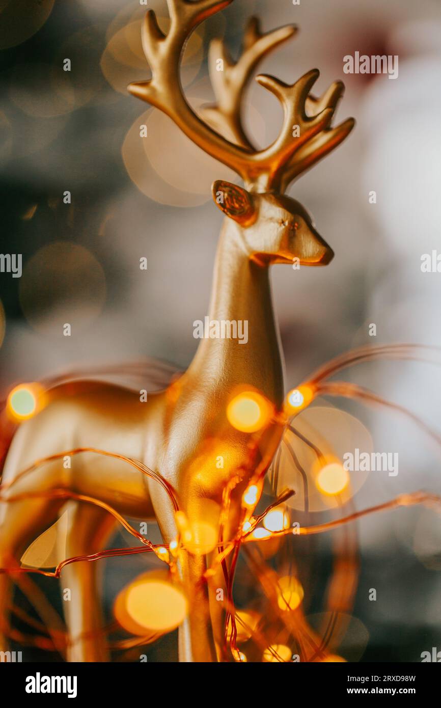 Christmas gold deer.Christmas decorations. figurine of golden deer with ...