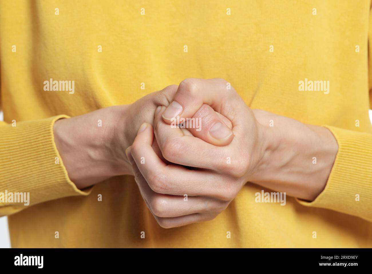 Female popping knuckles hi-res stock photography and images - Alamy