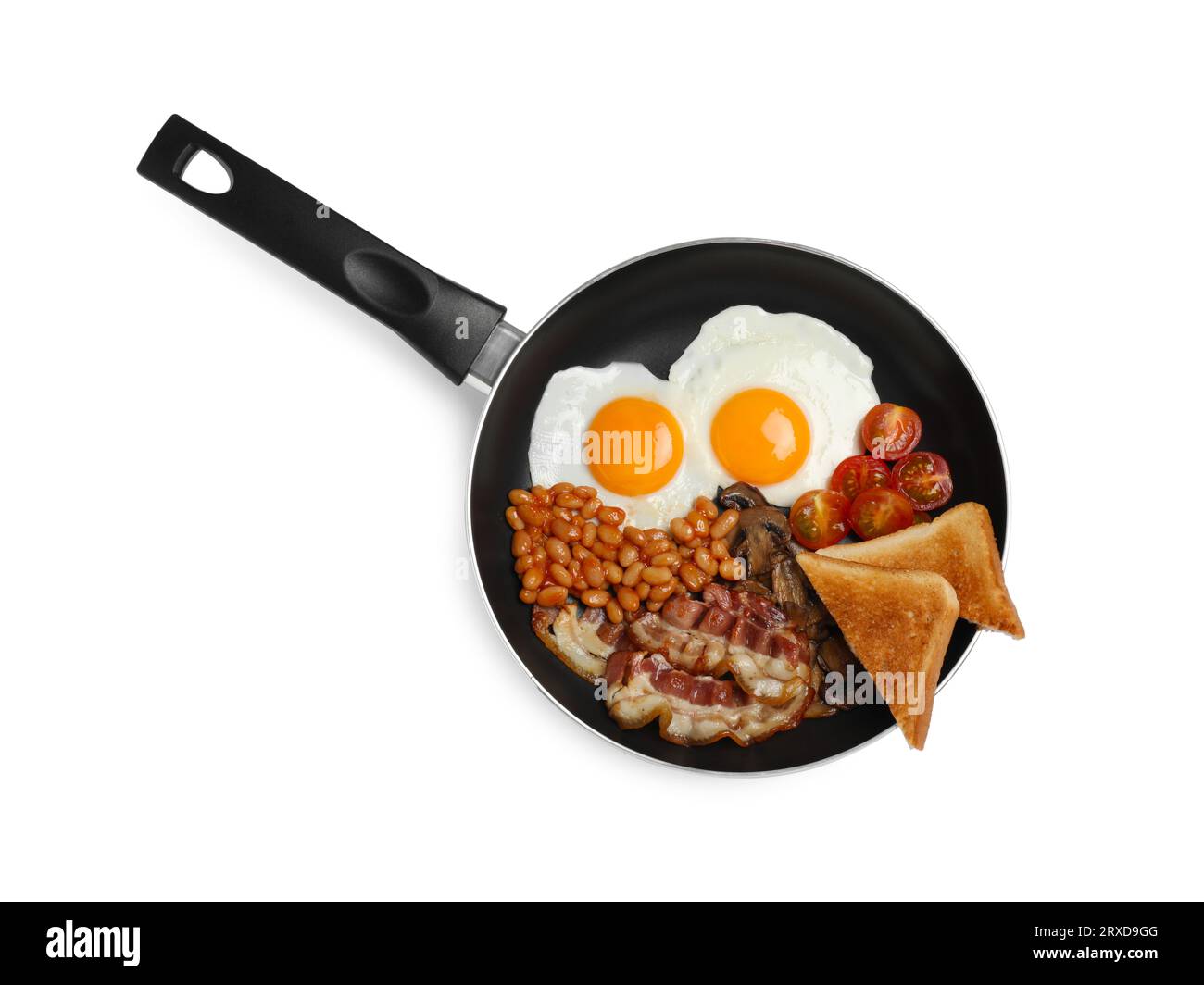 Frying pan with cooked traditional English breakfast isolated on white ...