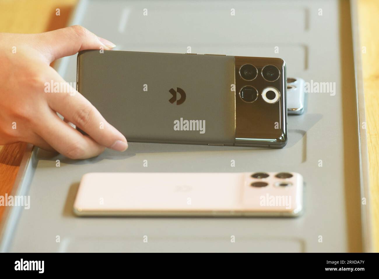 HANGZHOU, CHINA - SEPTEMBER 24, 2023 - A customer experiences NIO Phone ...