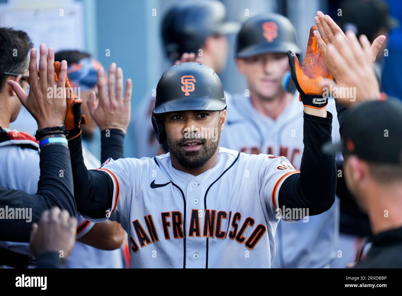 San Francisco Giants' LaMonte Wade Jr. celebrates in the dugout after ...