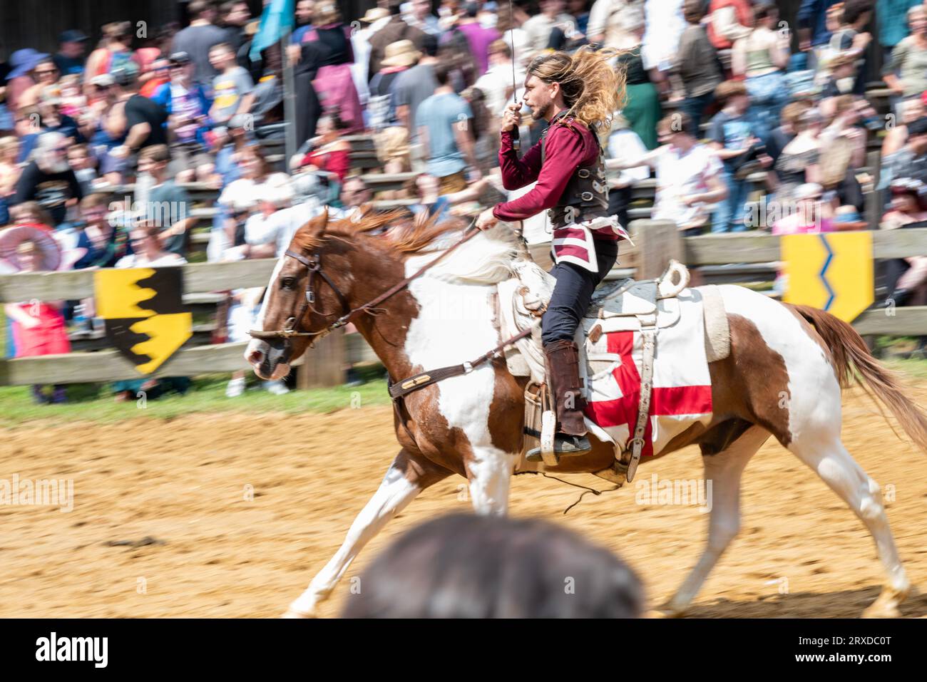 A man on horseback rides during jousting match at a Renaissance ...