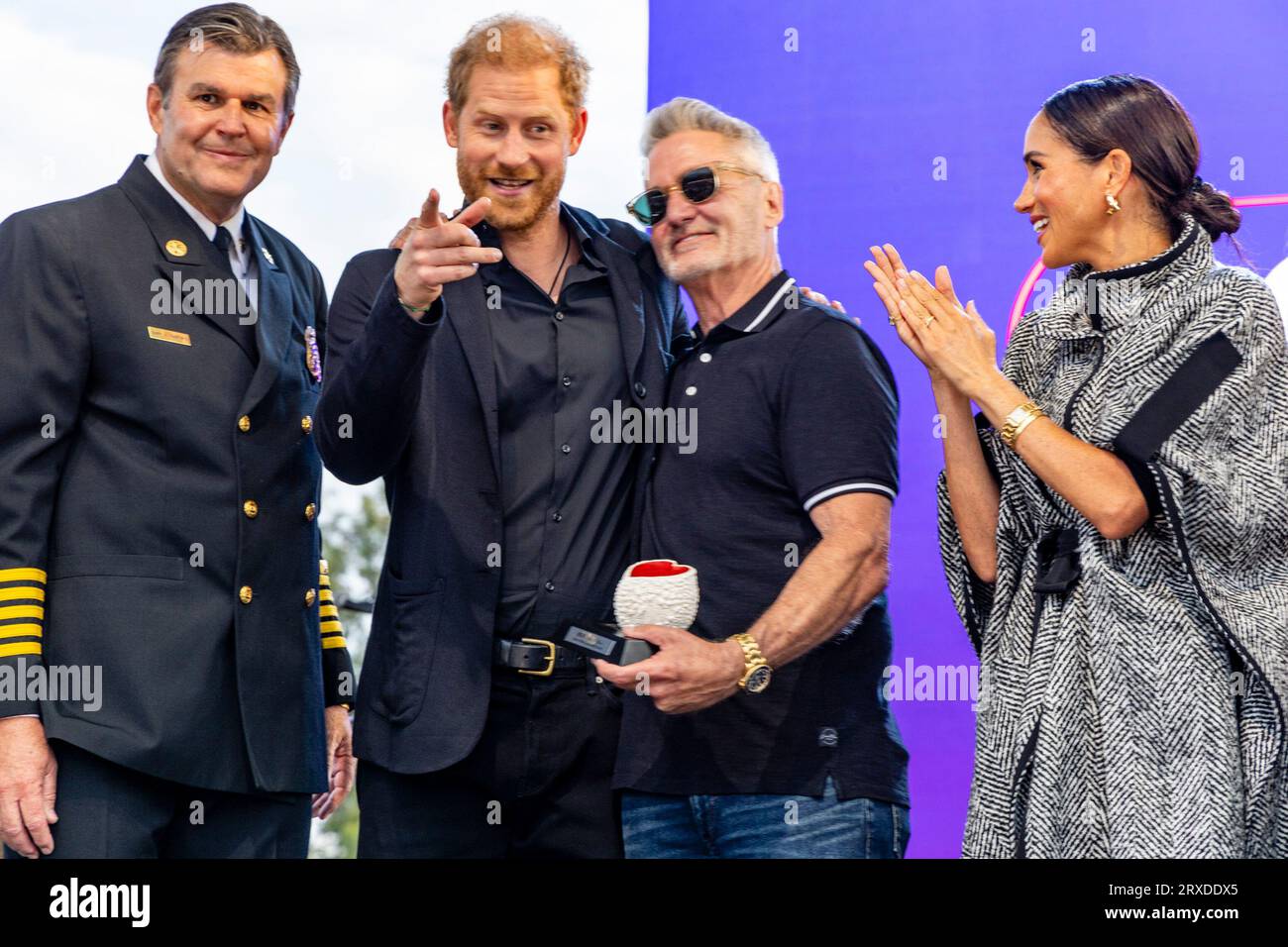 Prince Harry, Heart of the Community honoree Adam McKaig and Meghan ...