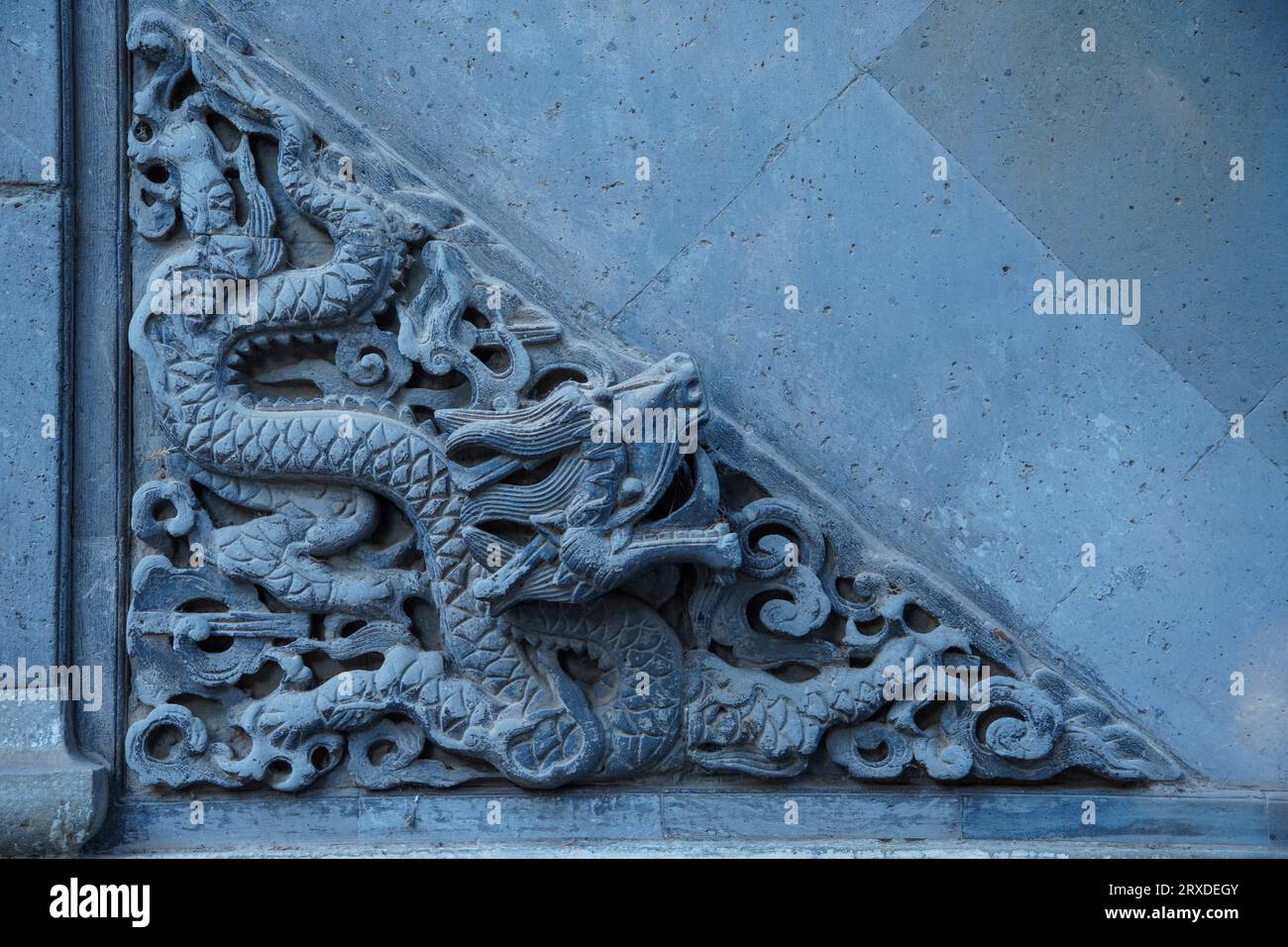 Ancient dragon wall carving in hi-res stock photography and images - Alamy