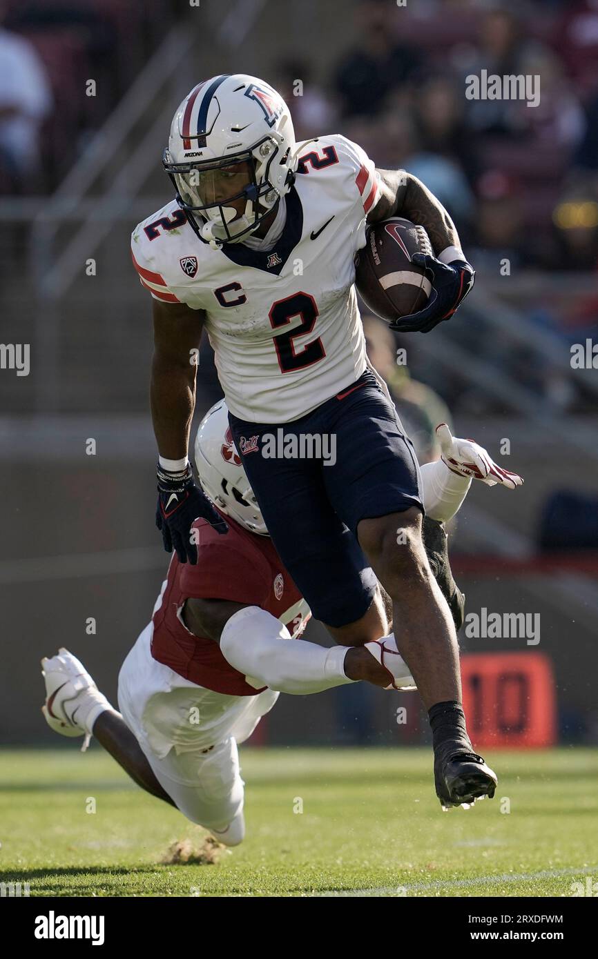 Arizona wide receiver Jacob Cowing (2) is tackled by Stanford ...
