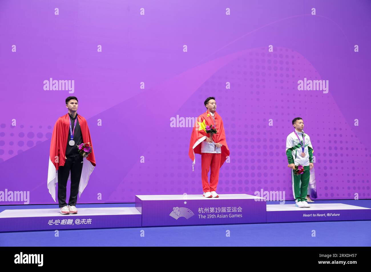 Hangzhou, China. 24th Sep, 2023. (L-R) Marvelo Edgar Xavier (INA), Sun ...