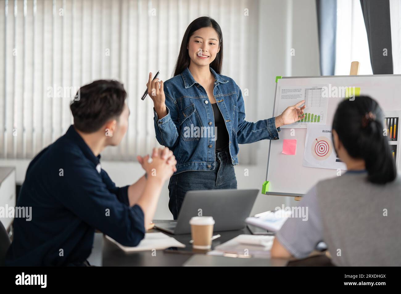 A confident and professional Asian businesswoman or female marketing ...