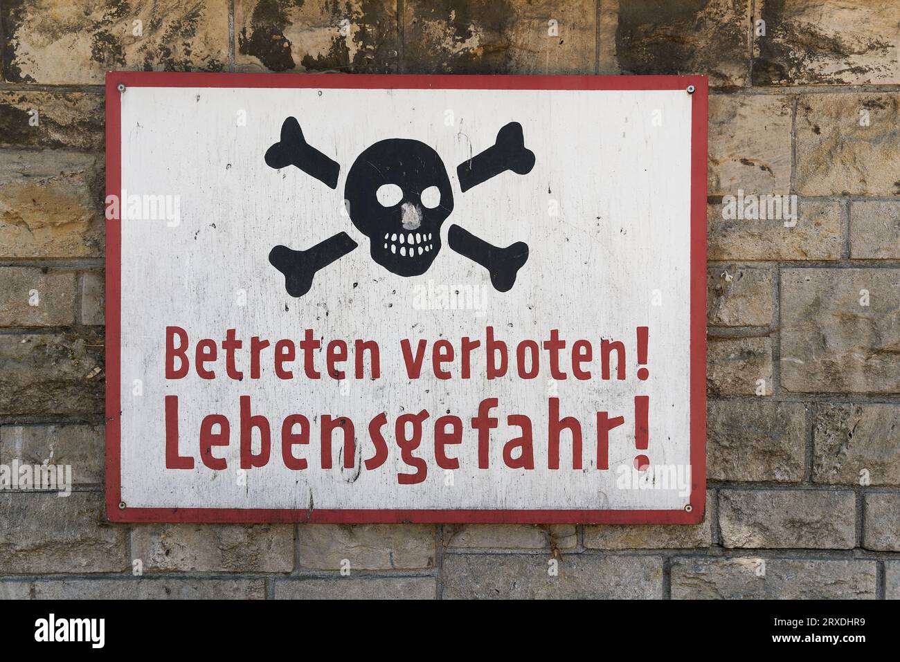 Hand painted sign on old company premises with german inscription ...