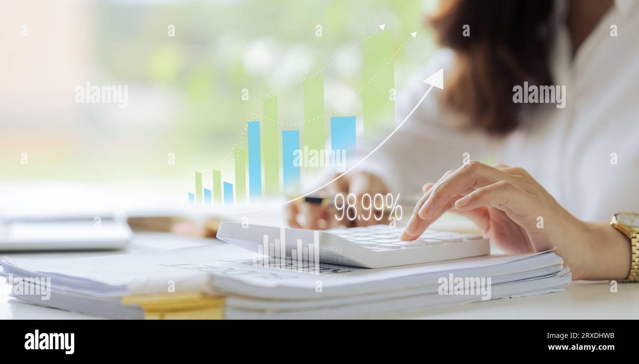 Businesswoman analyzing company's financial balance sheet working with ...