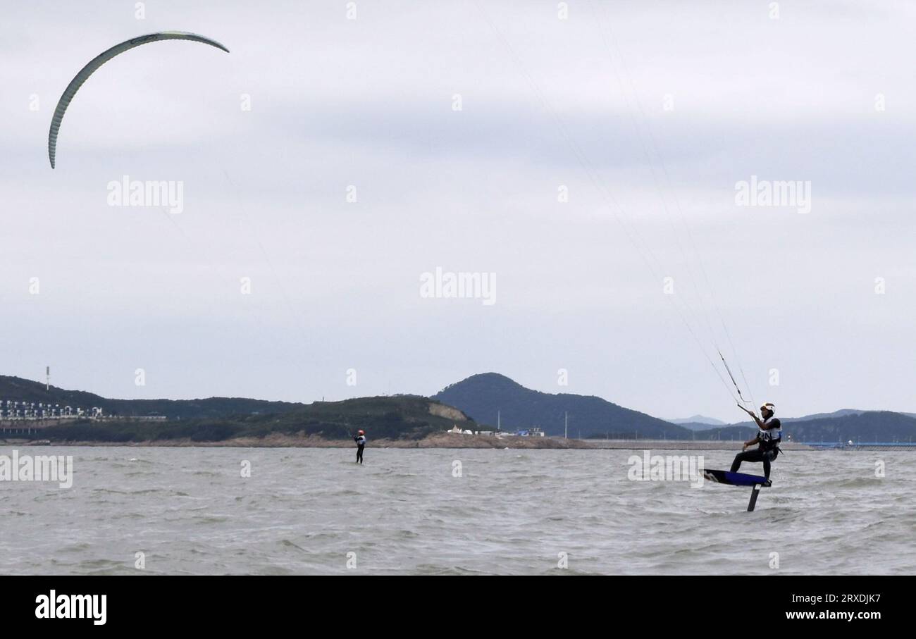 Rune Miyoshi of Japan crosses the finish line in the men's IKA formula ...