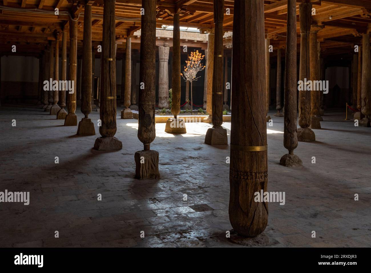 Ancient wooden columns of the medieval Juma mosque. Khiva, Uzbekistan ...