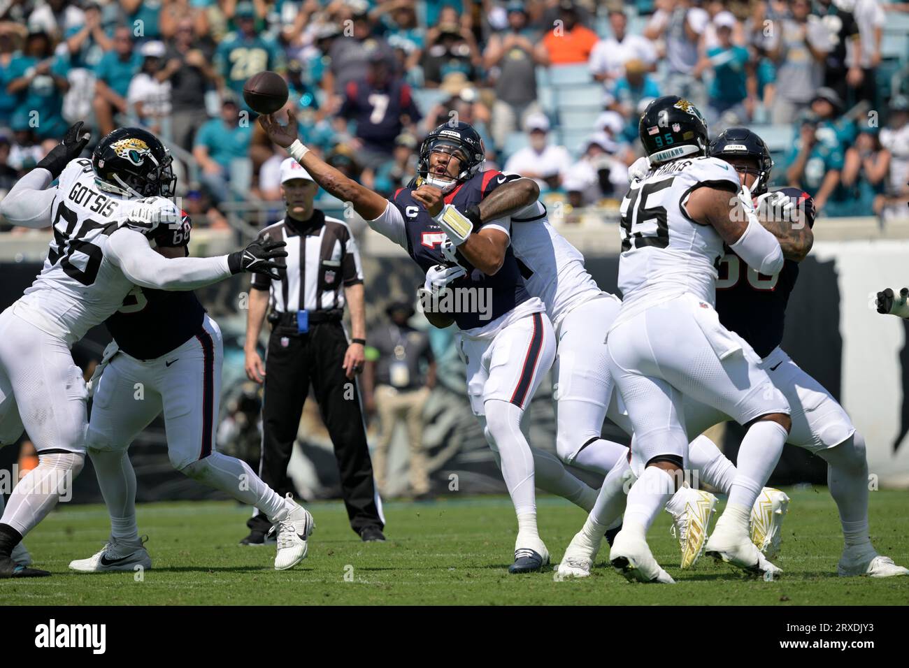 Houston Texans quarterback C.J. Stroud (7) is hit by Jacksonville ...