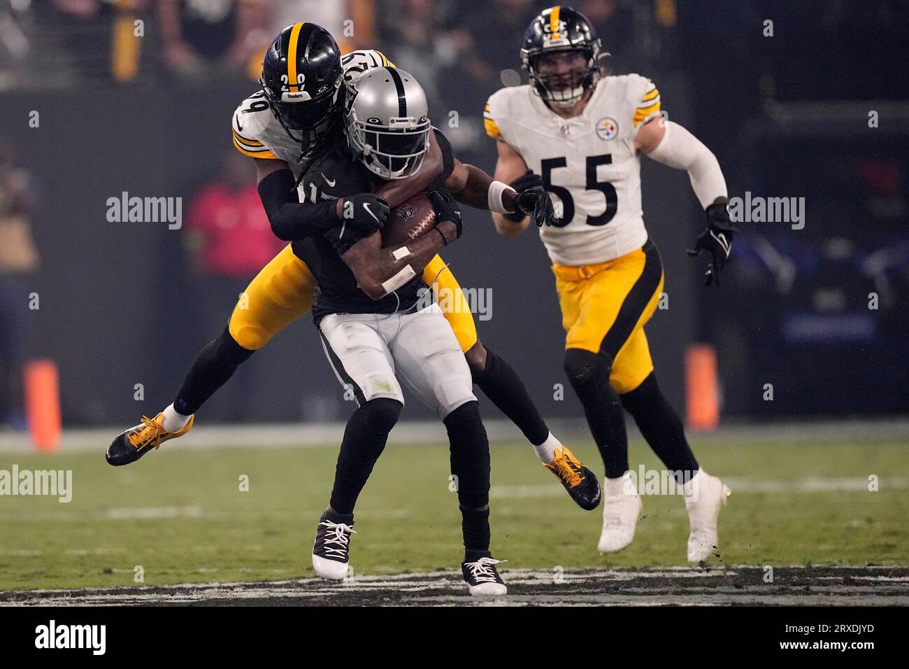 Las Vegas Raiders wide receiver Davante Adams is tackled Pittsburgh ...