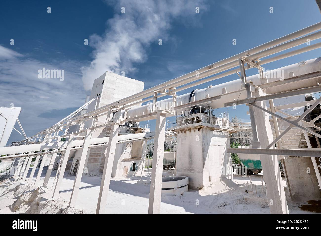 Long tubular rotary furnace at silica factory on sunny day Stock Photo ...