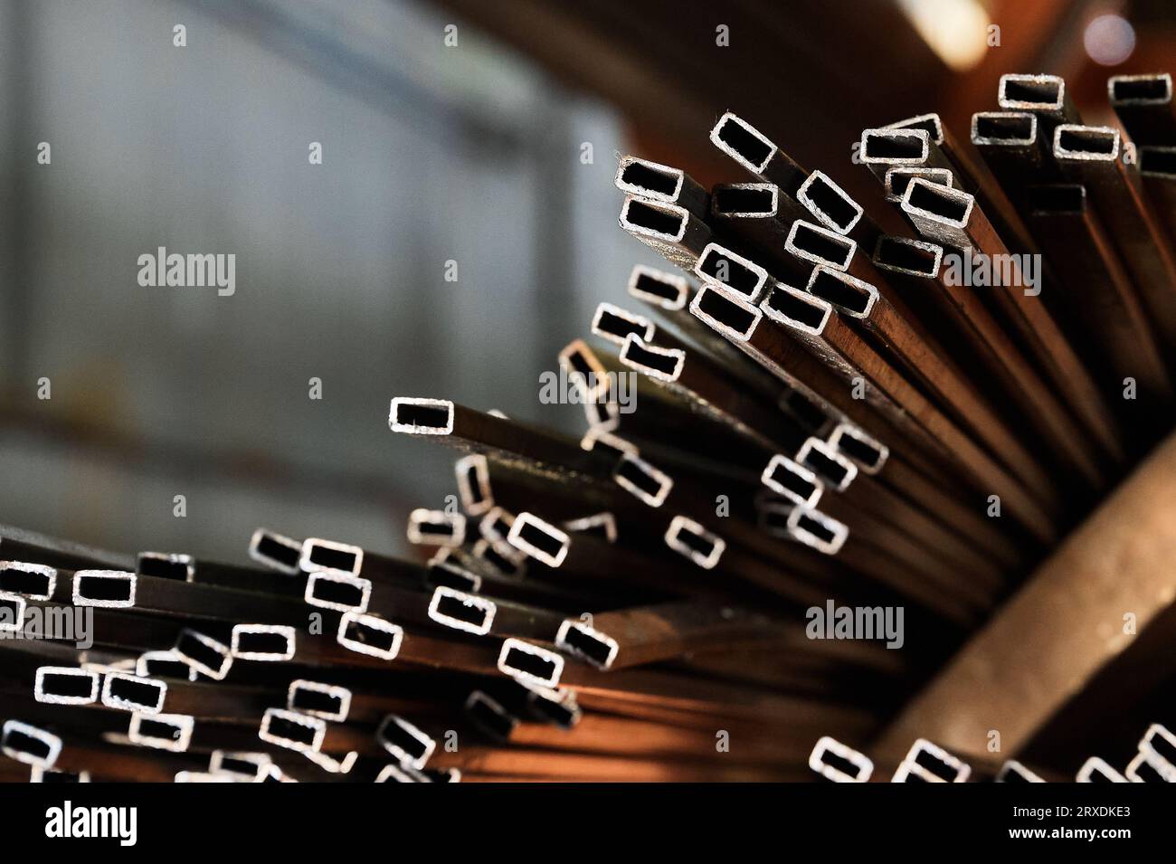 Rectangle heat tubing on rack in cold factory warehouse Stock Photo - Alamy