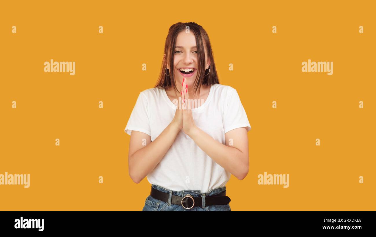 Amazement emotion surprised woman clapping hands Stock Photo - Alamy