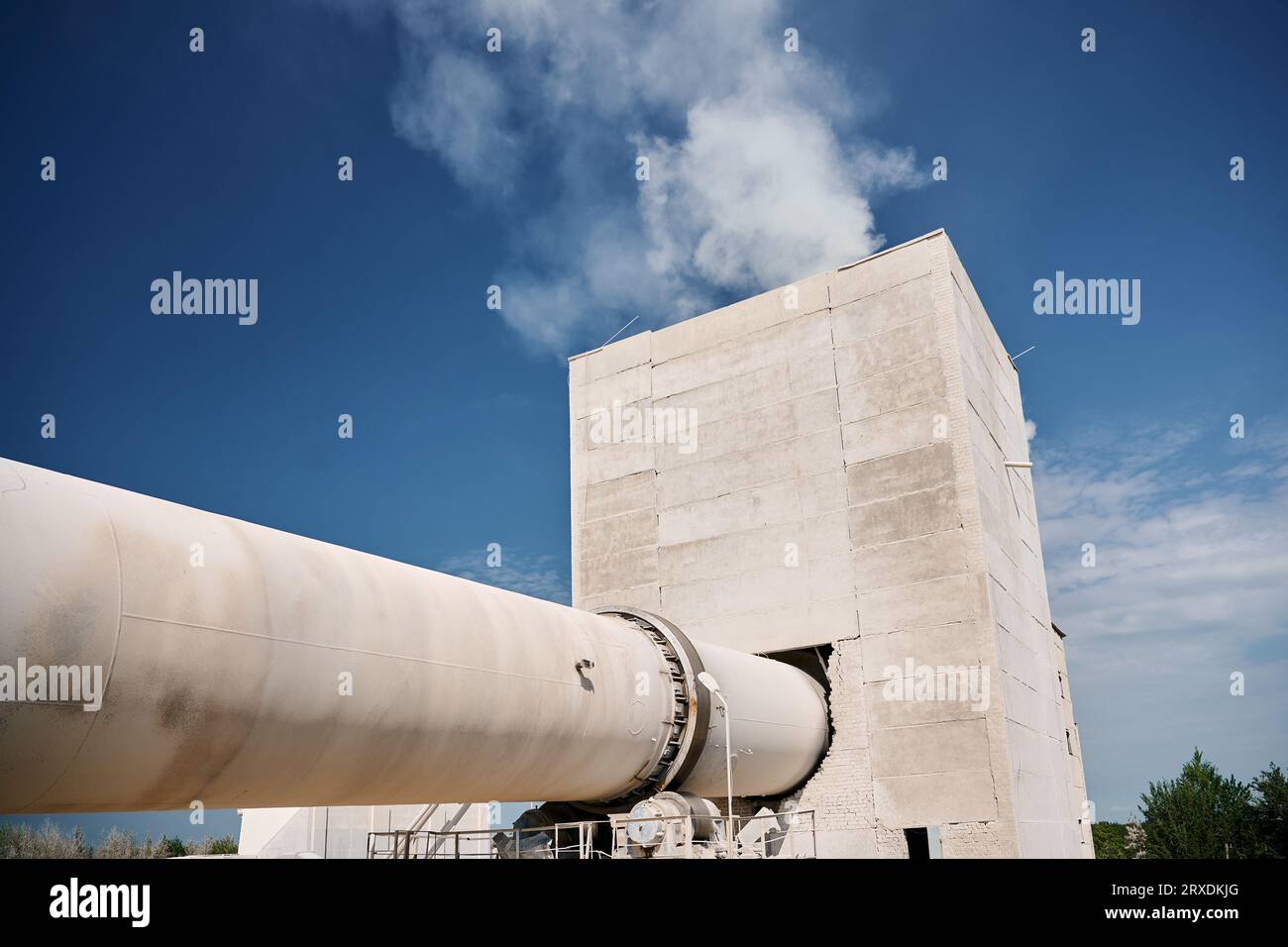 Building of loading device of roasting rotary furnace Stock Photo - Alamy