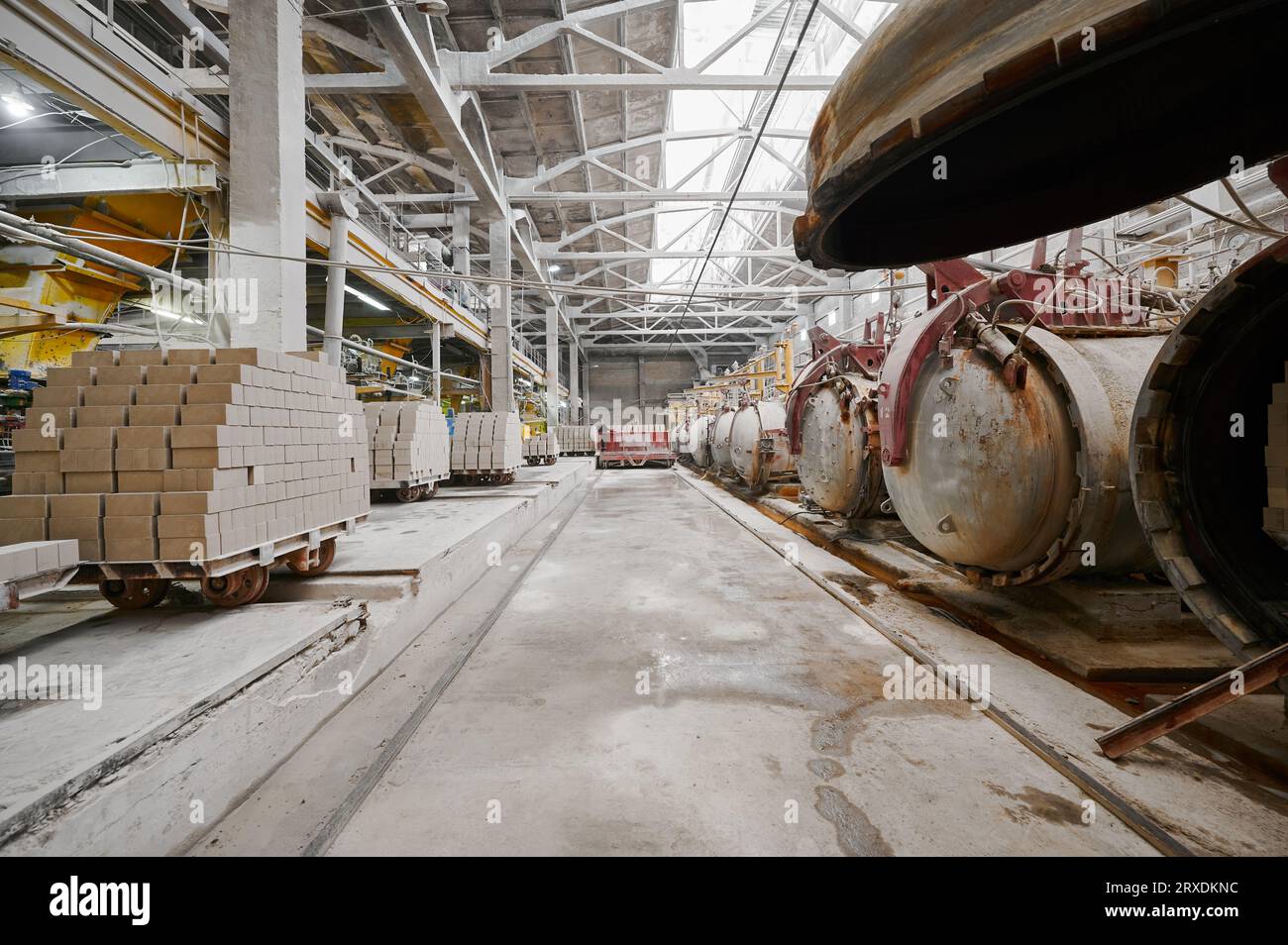 Autoclaves for hardening concrete bricks in plant workshop Stock Photo ...