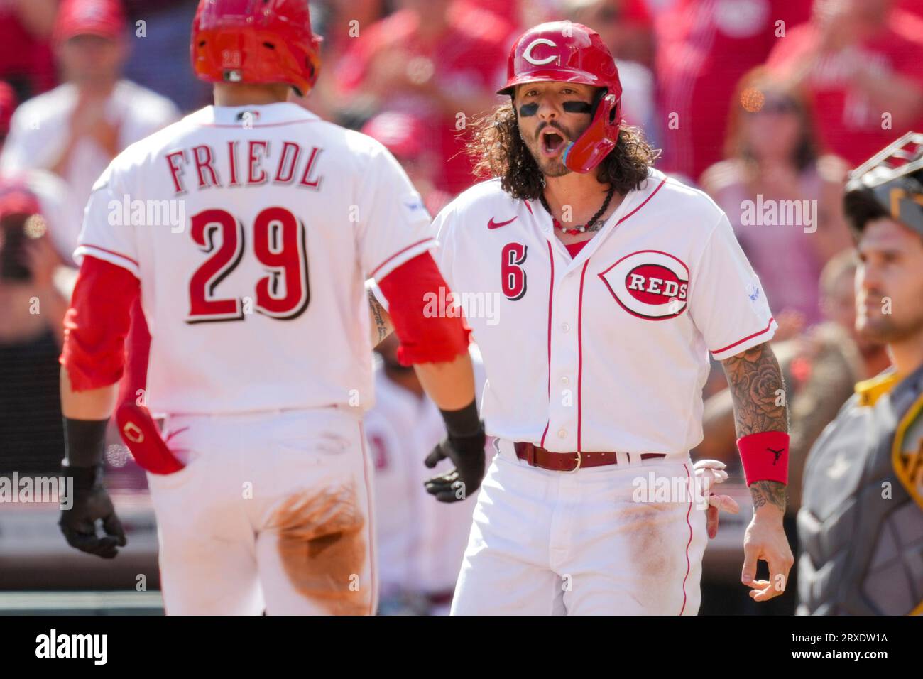 Cincinnati Reds' Jonathan India reacts at home plate after TJ Friedl ...