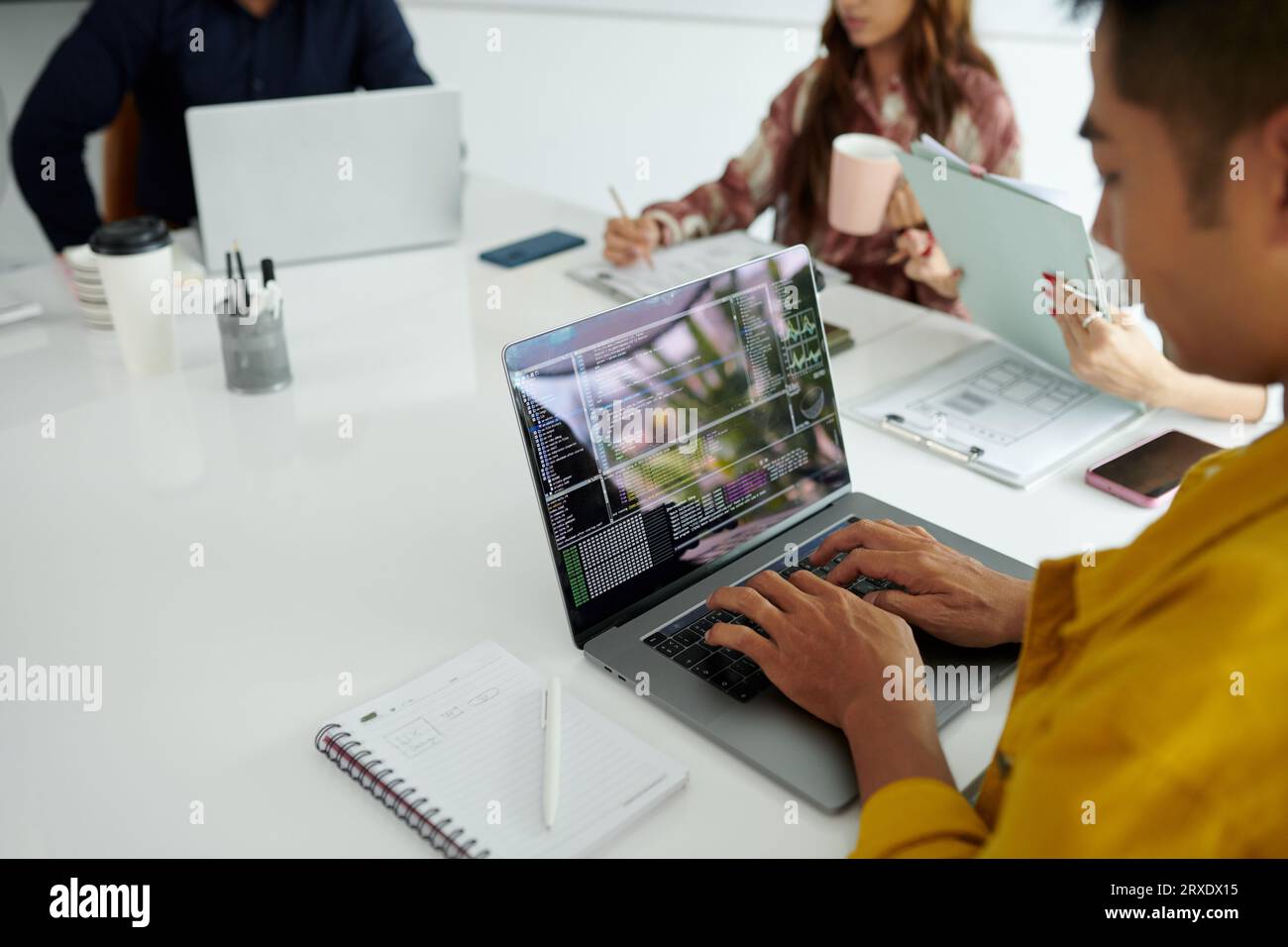 Programming code on laptop screen of software developer Stock Photo - Alamy