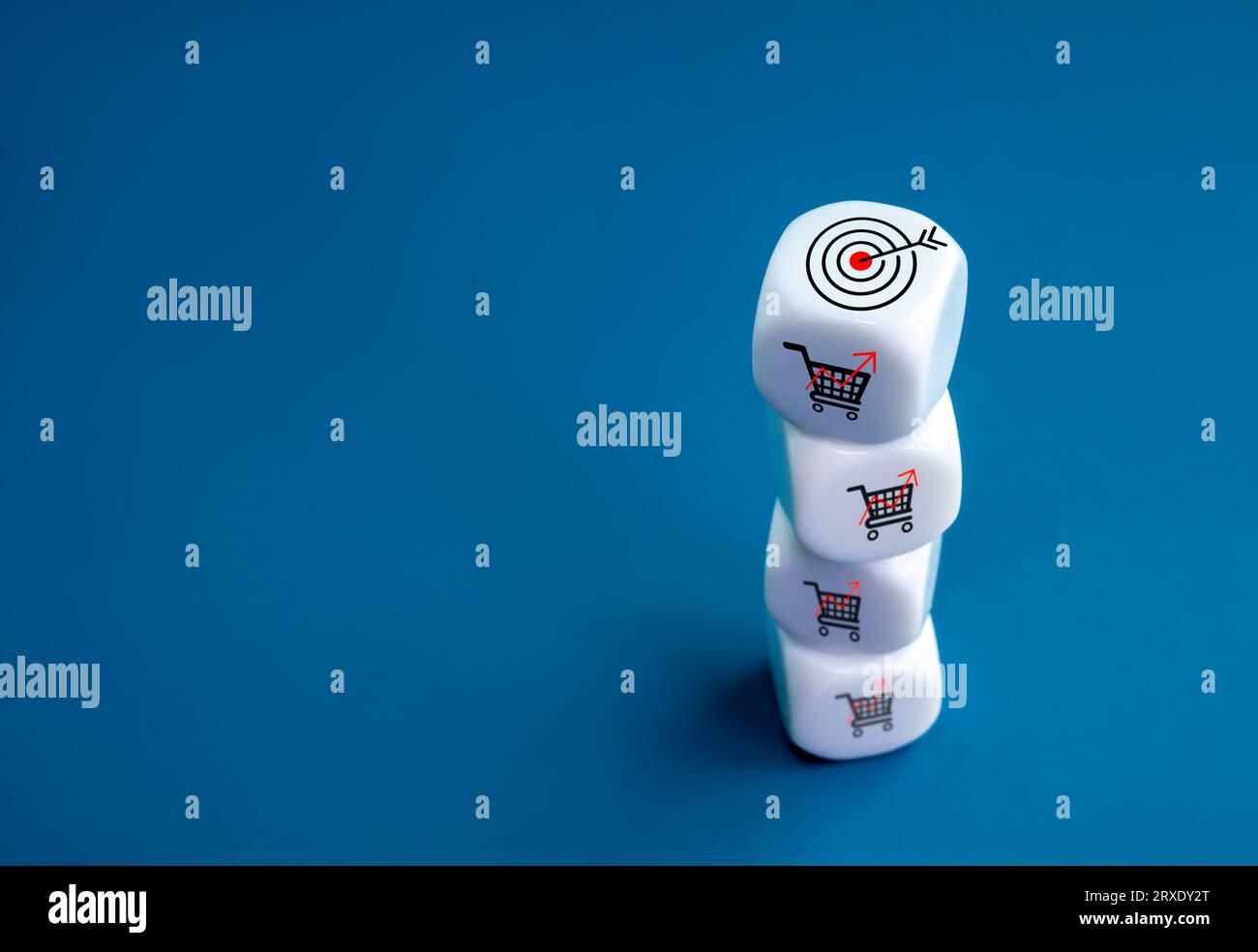 Target icon on top of white cube block stack with red growth graph ...