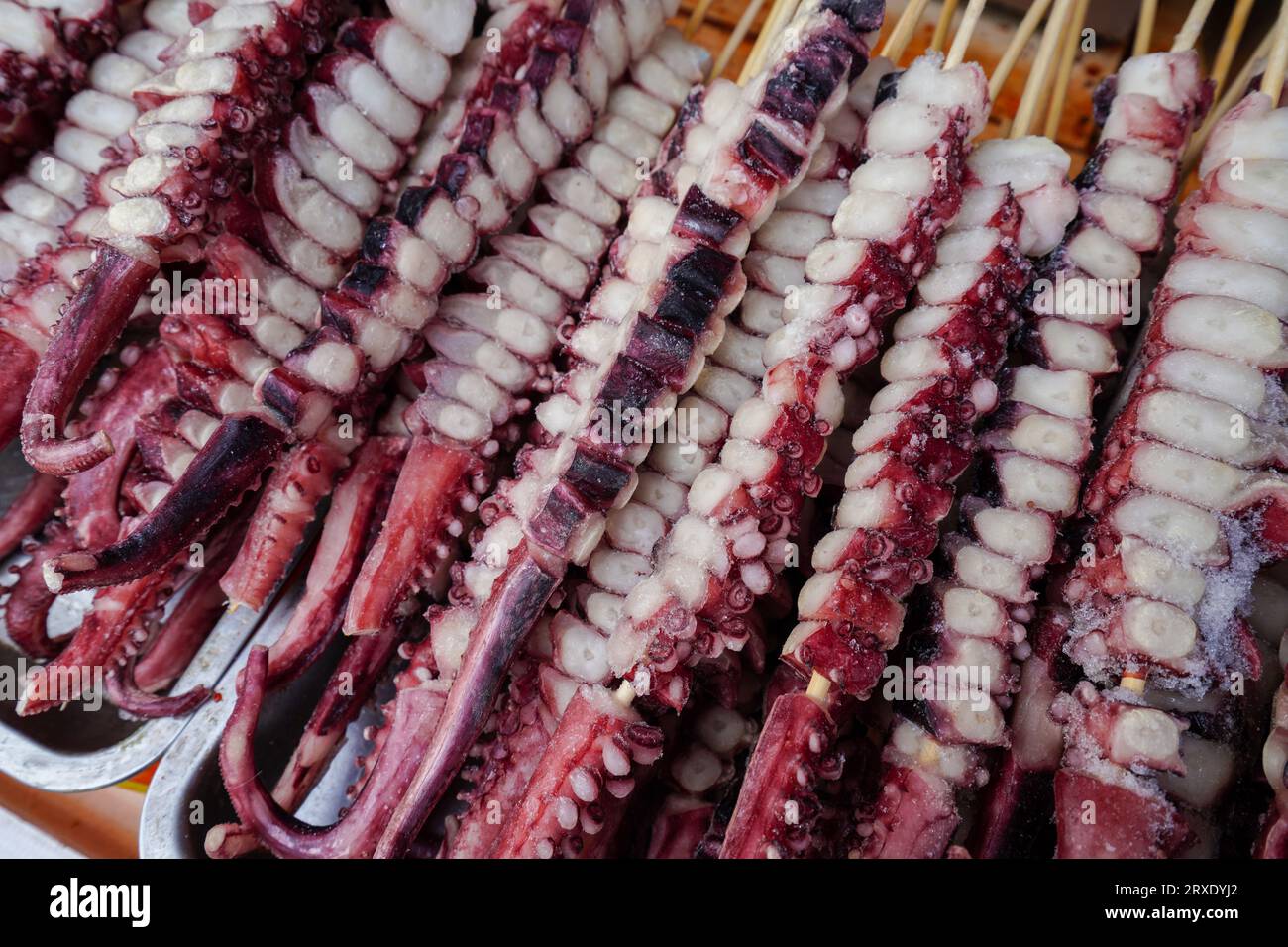 Barbecue ingredient squid leg, close-up photo Stock Photo - Alamy