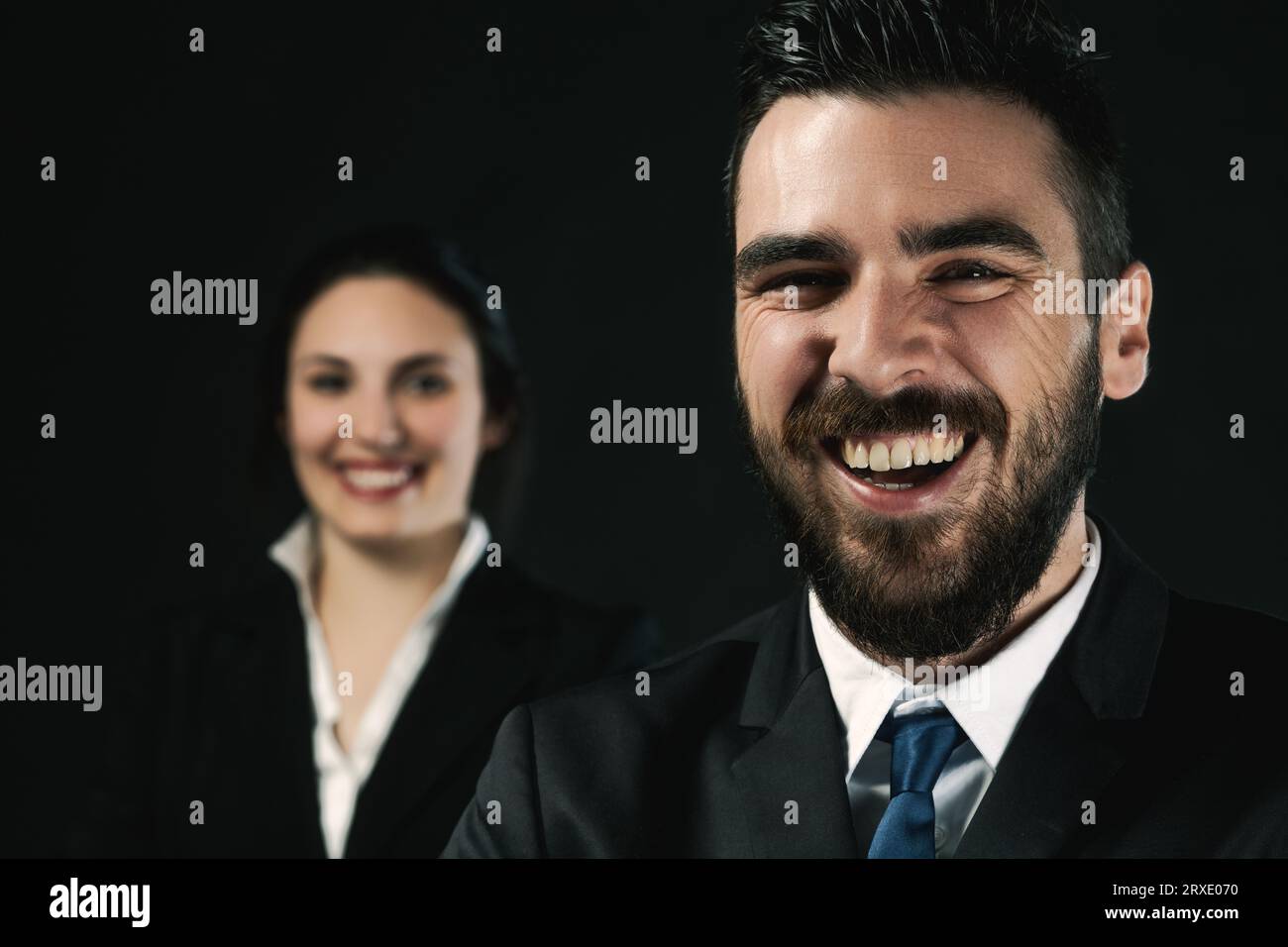 Image depicts a focused man and a blurred woman as legal or government ...