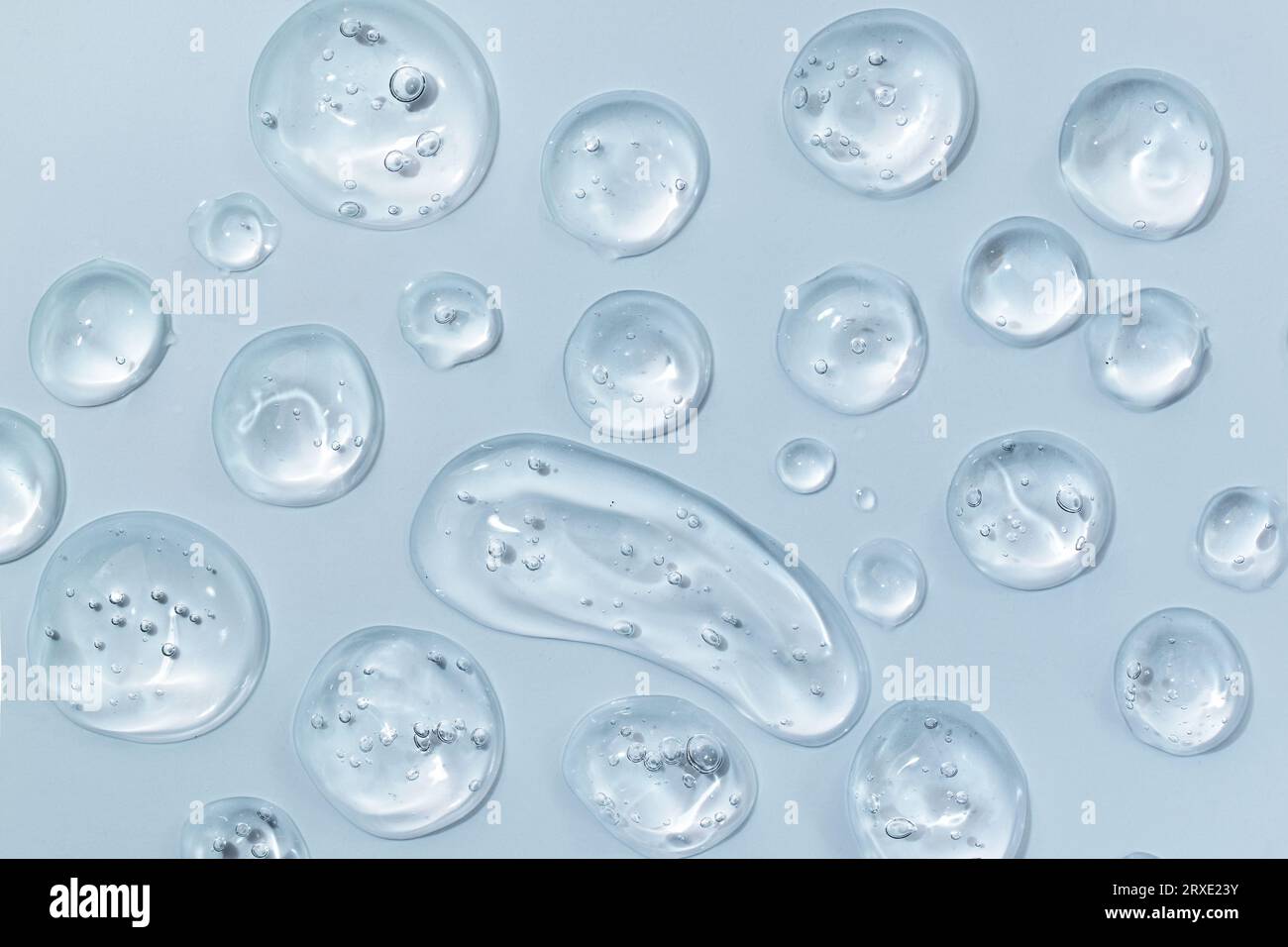 Drops of gel face serum top view. Abstract gel drops for design. Liquid ...