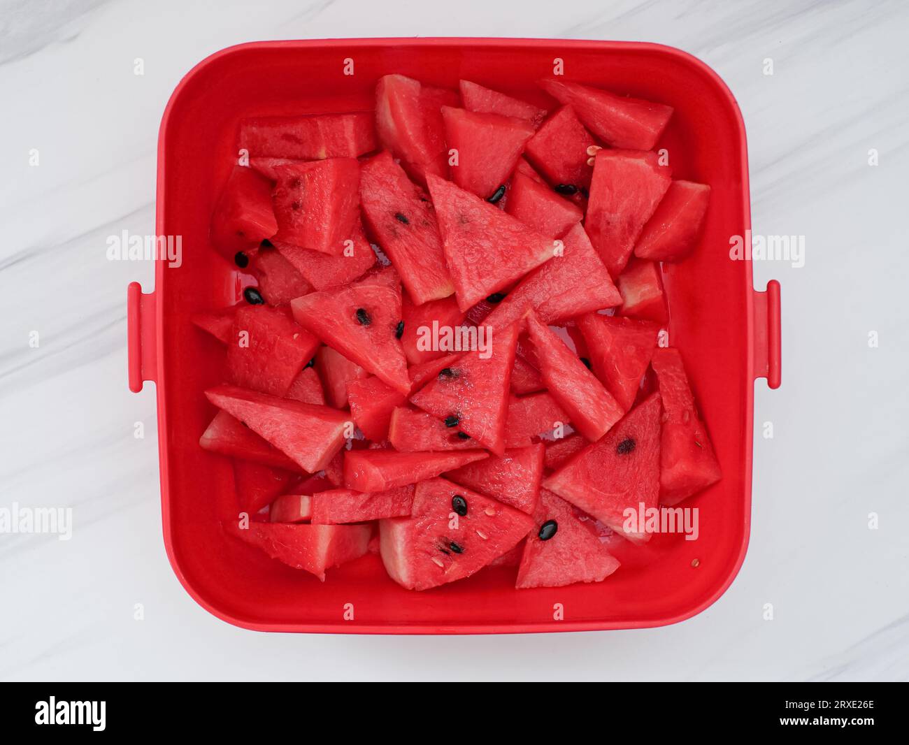 Watermelon slices in plastic bowl hi-res stock photography and images ...