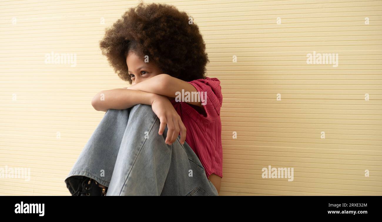 African American child. Afro kid (daughter) in a crying sad expression ...
