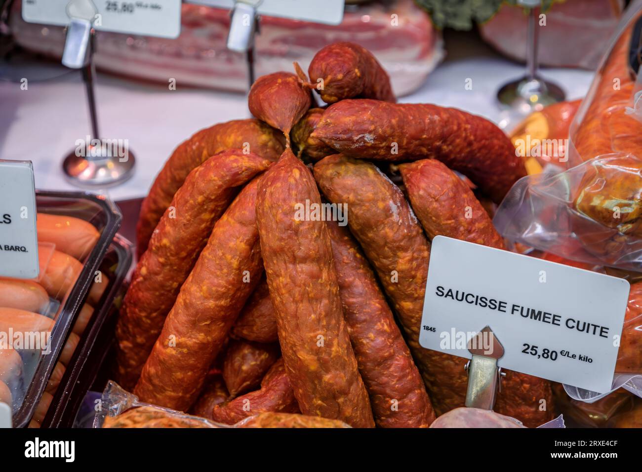 Artisanal smoked pork sausages on display at a butcher shop on the ...