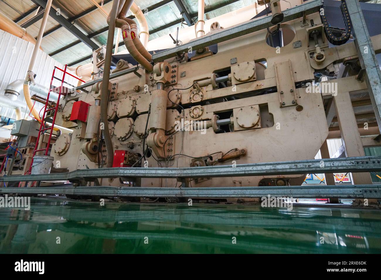 Industrial production line mechanical equipment in a factory Stock ...