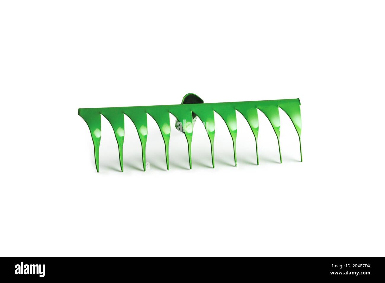Green garden rake. Close-up. Isolated on white background Stock Photo ...
