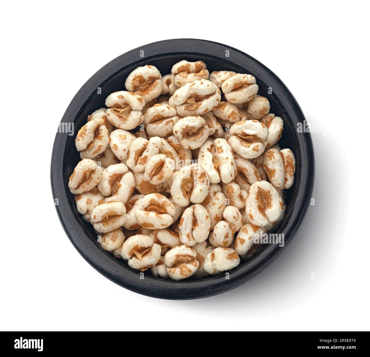 Puffed wheat isolated on white background, top view Stock Photo - Alamy