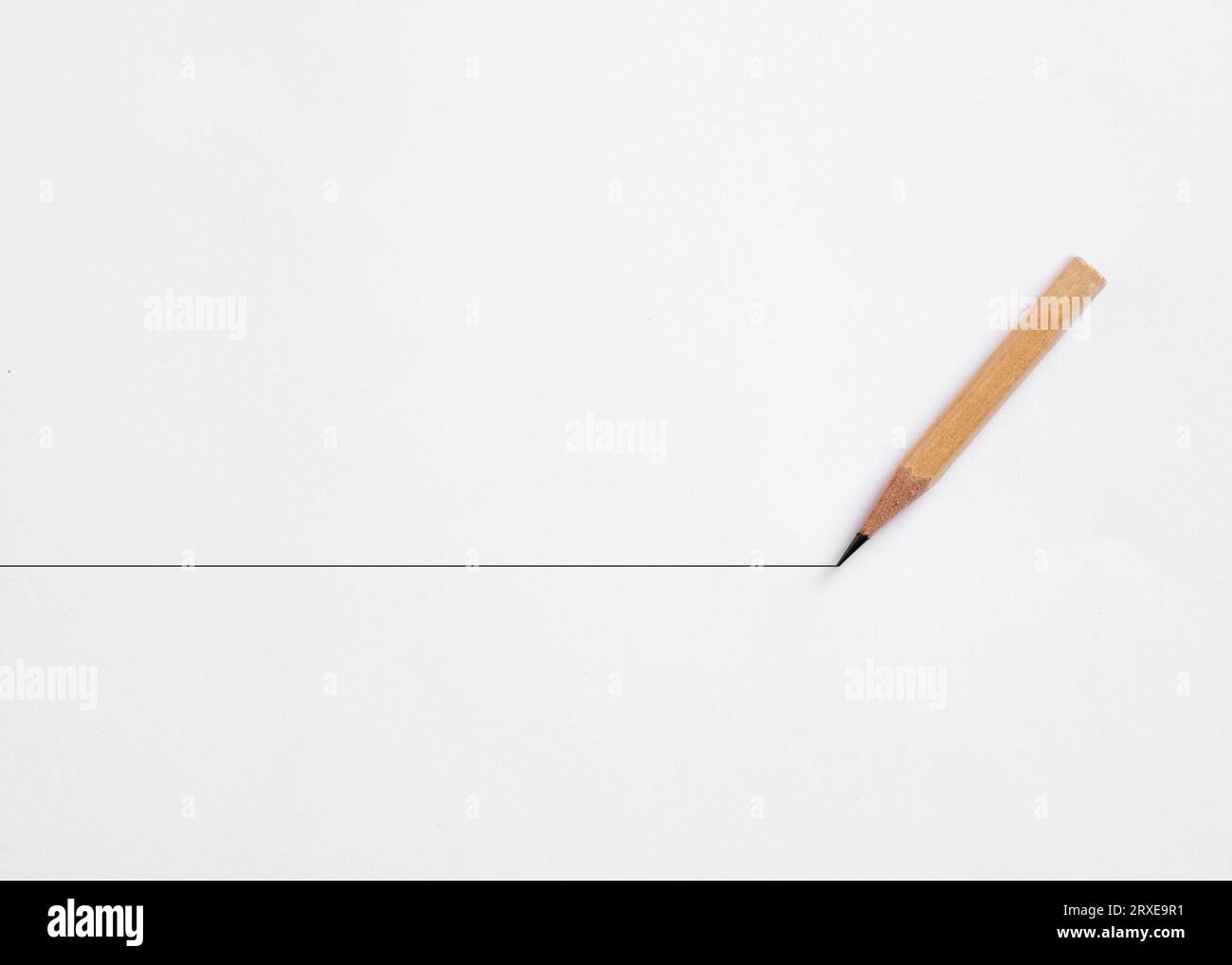 Pencil draws a horizontal line on white background. Stability and ...