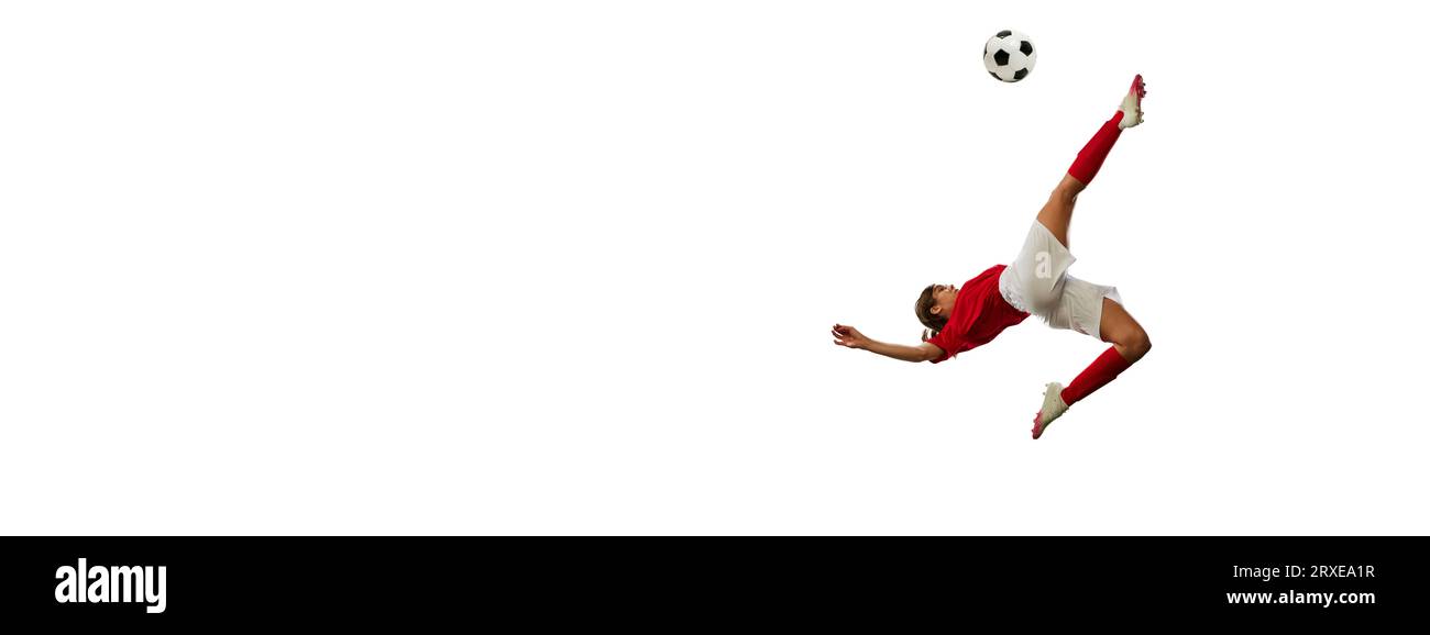 Competitive and motivated young girl, football player in motion ...
