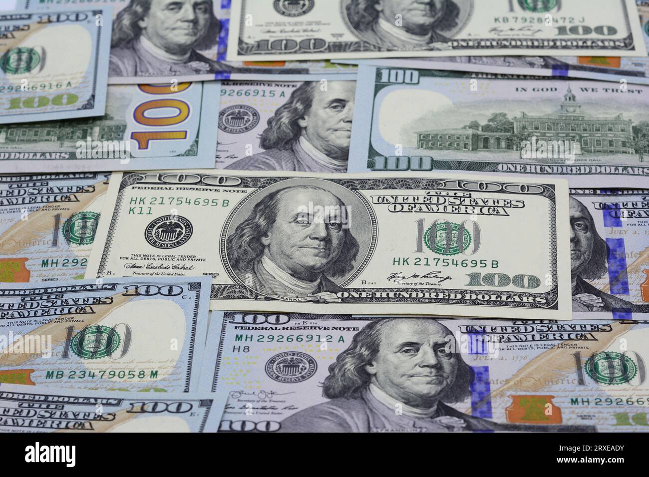Background of 100 dollar bills. Texture old and new US dollar bills Stock Photo - Alamy