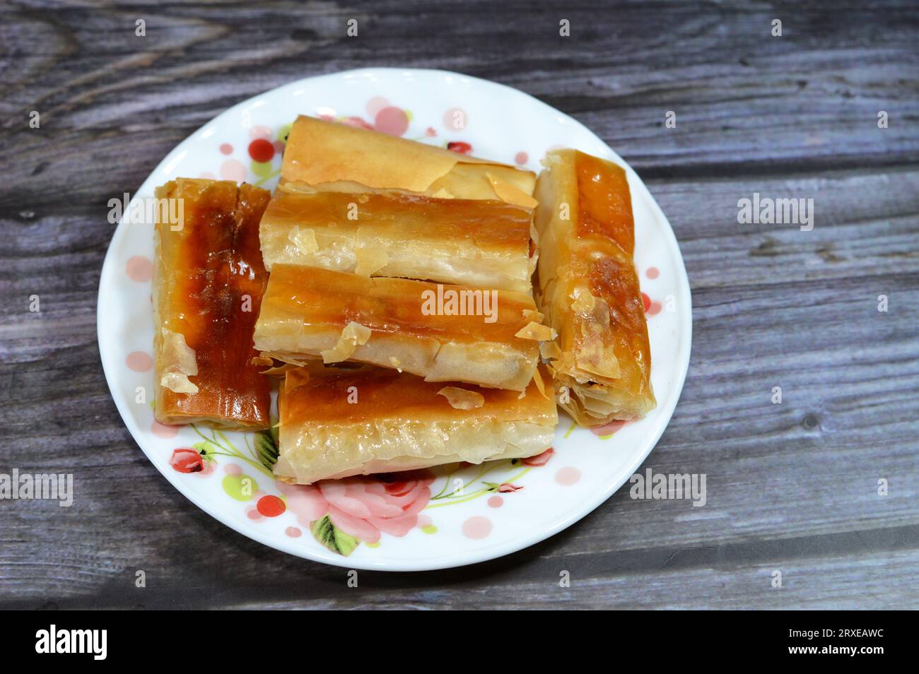 rolled baklava, a sweet middle eastern dessert stuffed with nuts ...