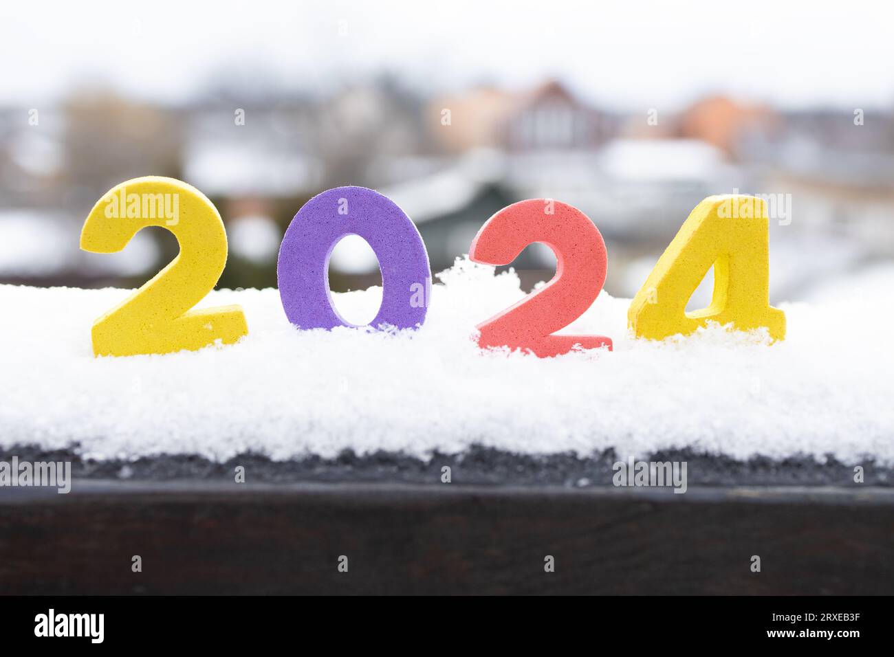 multi-colored numbers 2024 in the snow. Time for a change. winter ...
