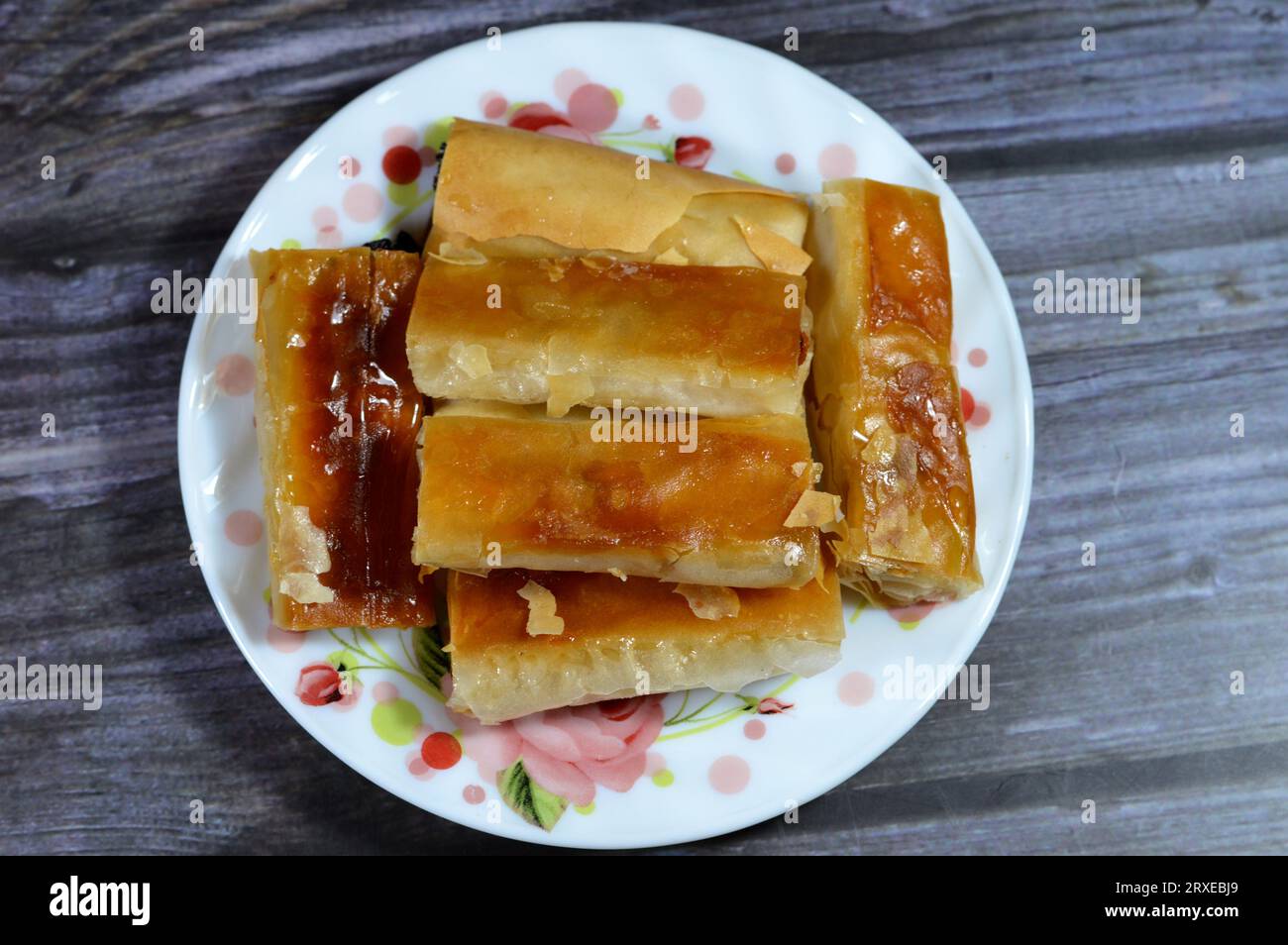 rolled baklava, a sweet middle eastern dessert stuffed with nuts ...