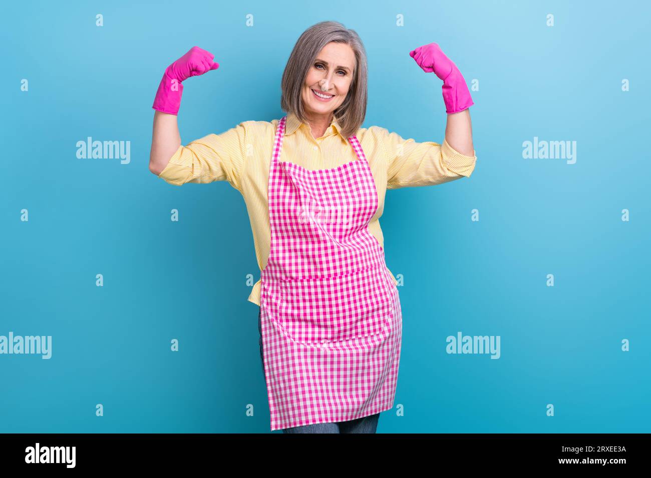 Portrait of positive successful person arms latex gloves show flex ...