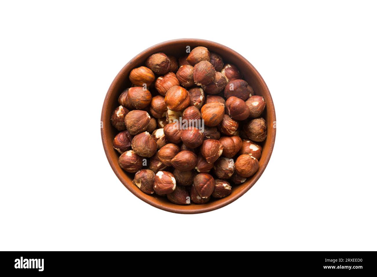 Roasted hazelnut in bowl isolated on white background. hazelnut is ...