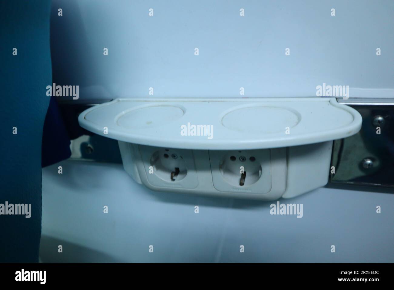 interior inside an executive train. electric plugs. drinking stand ...