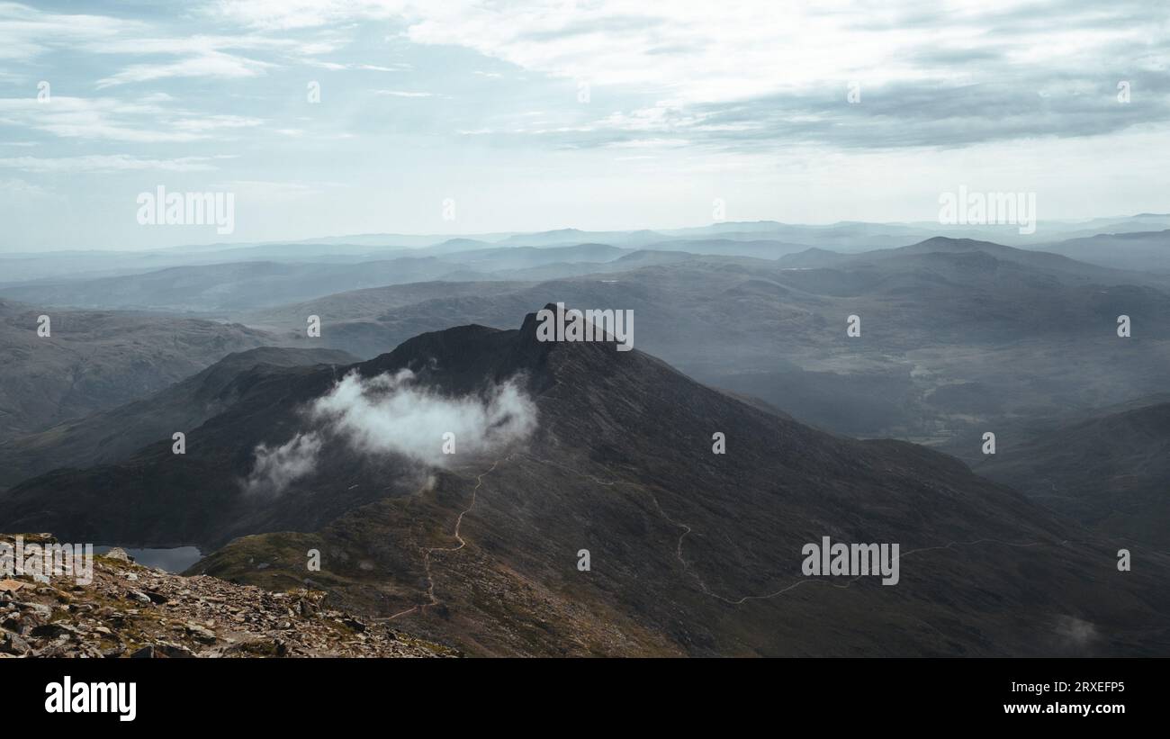 Summit of Yr Wyddfa / Snowdon looking across Snowdonia and Watkin ...