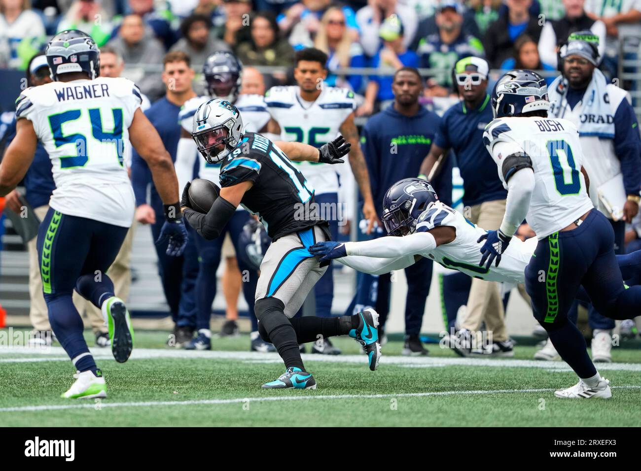 Carolina Panthers wide receiver Adam Thielen is tackled by Seattle ...
