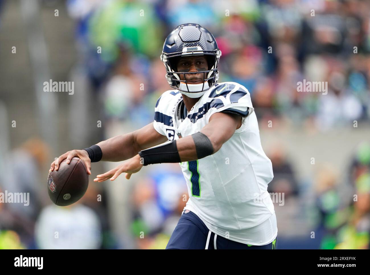Seattle Seahawks quarterback Geno Smith looks to pass during an NFL ...